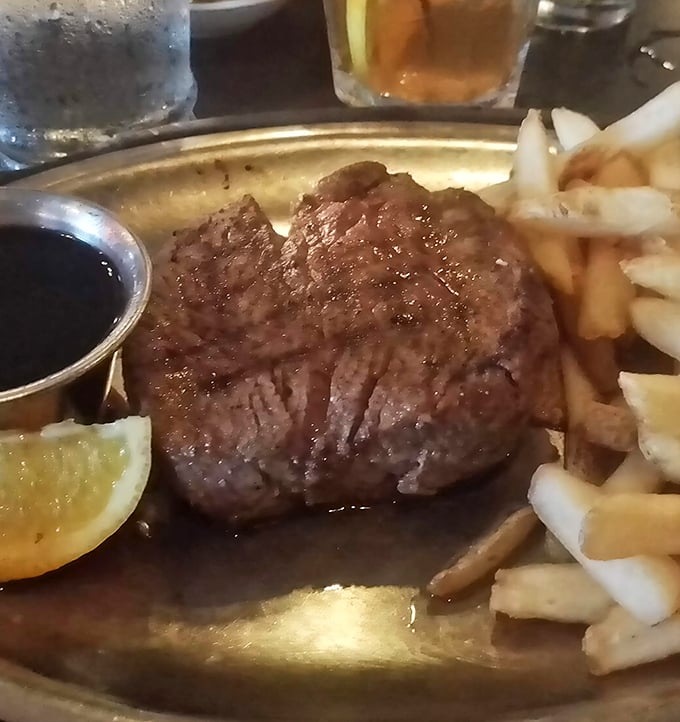 This sirloin steak isn't just cooked—it's been understood. Paired with golden fries and a side of au jus that's practically drinkable.