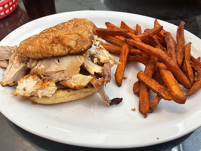 Smoked chicken that falls apart at first touch, served with sweet potato fries that could make a nutritionist weep tears of joy.