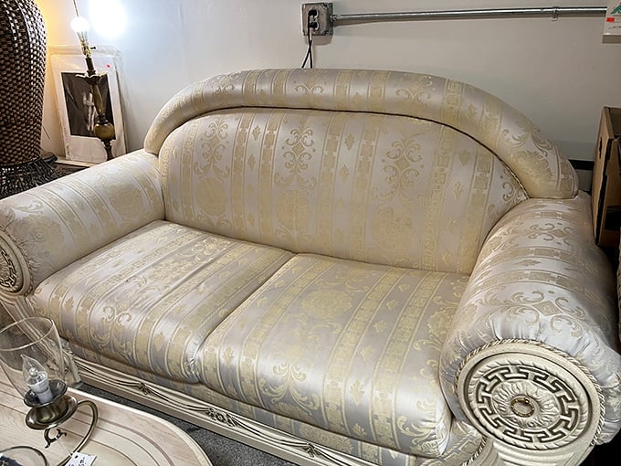 The throne room! This cream brocade sofa isn't just seating—it's a statement piece that screams "I've hosted fancy people!"