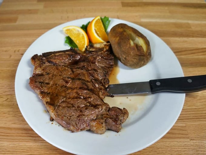 Steak that needs no introduction, just a sharp knife and your undivided attention. The orange garnish isn't just pretty – it's a flavor wake-up call.