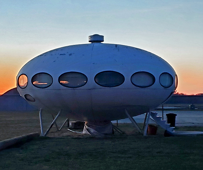 Twilight transforms the Futuro into something truly magical. As the sun sets, those oval windows glow like the eyes of a spacecraft preparing for night flight.