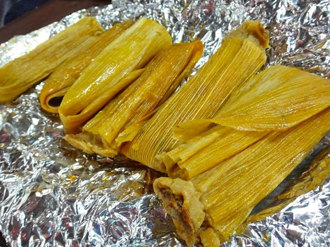These tamales aren't just wrapped in corn husks—they're bundled in tradition, each one a little present waiting to be unwrapped and devoured.