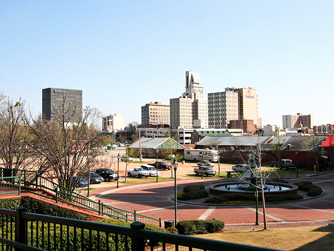 Augusta's skyline reflects in the Savannah River like your retirement dreams reflecting in your bank statement when living costs drop 25%.