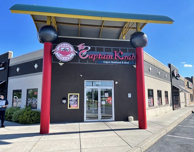 Captain Krab (storefront): "Those bold red pillars aren't just for show—they're signaling that Cajun seafood excitement awaits inside!"