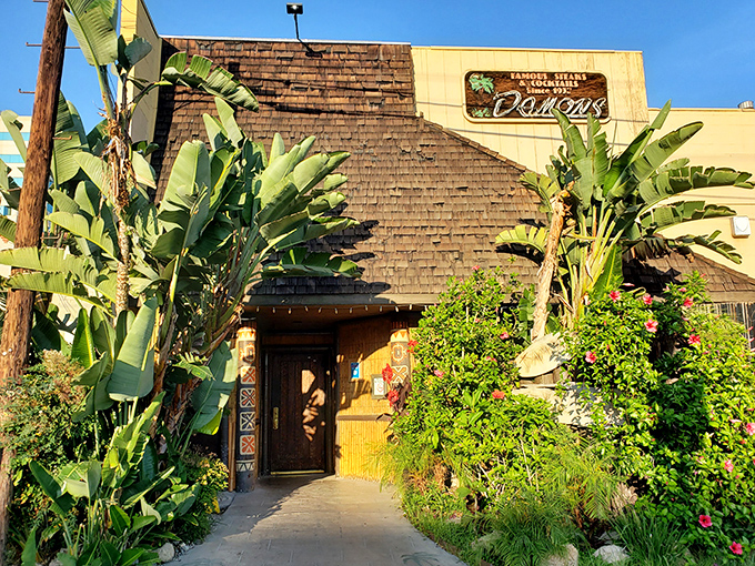 Damon's tropical exterior hints at Polynesian flair – unexpected paradise for serious steak enthusiasts everywhere.