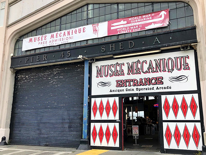 The classic pier arcade entrance promises mechanical wonders that have delighted visitors for generations.