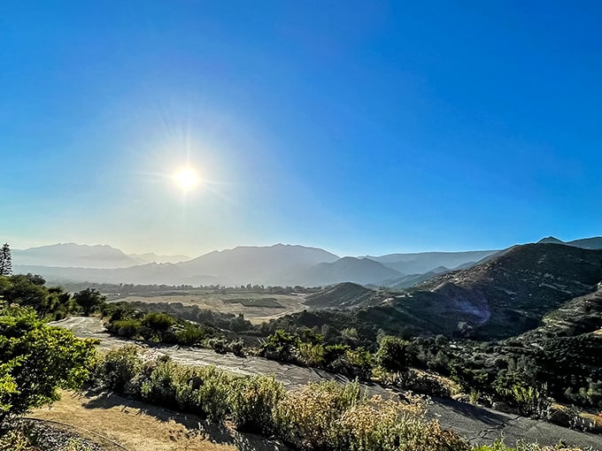 The view that launched a thousand meditation retreats. Ojai's mountains cradle the valley like they're protecting something precious—because they are.