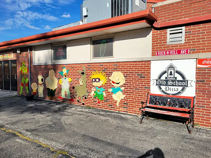 Those cartoon characters on the wall are your first clue—this place knows how to have fun while serving serious pizza.
