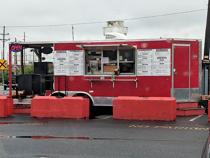 This bright red food truck is like finding a ruby in a parking lot – small space, enormous flavors.