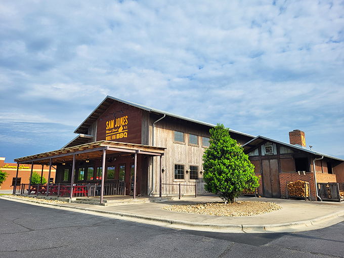 Sam Jones BBQ blends rustic charm with modern touches, like your favorite country song got a fresh remix. That wooden barn aesthetic just feels right.
