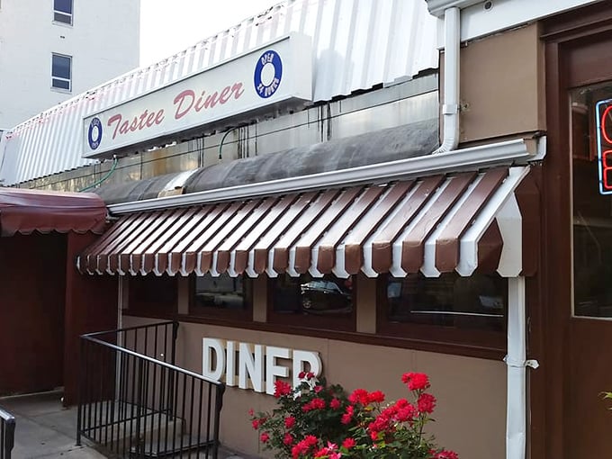 Tastee Diner's classic striped awnings have sheltered generations of late-night dreamers and early-morning philosophers.