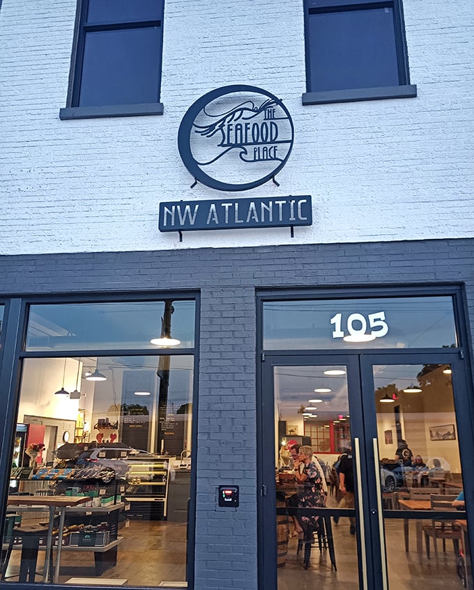 The Seafood Place's clean blue and white exterior is like the ocean itself—calm outside, full of treasures within.