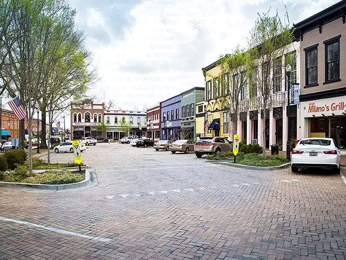 That yellow building pops like sunshine on Main Street – impossible to miss, impossible not to love.