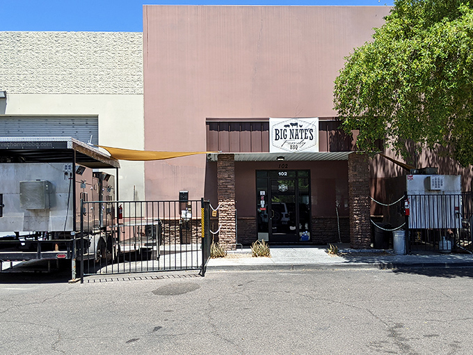 Desert landscaping frames the entrance to Big Nate's – where Arizona's natural beauty meets its delicious, smoky counterpart.