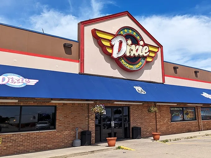 The colorful Dixie sign promises comfort food that'll make you forget your troubles. Blue skies and fried chicken—what more could you want?