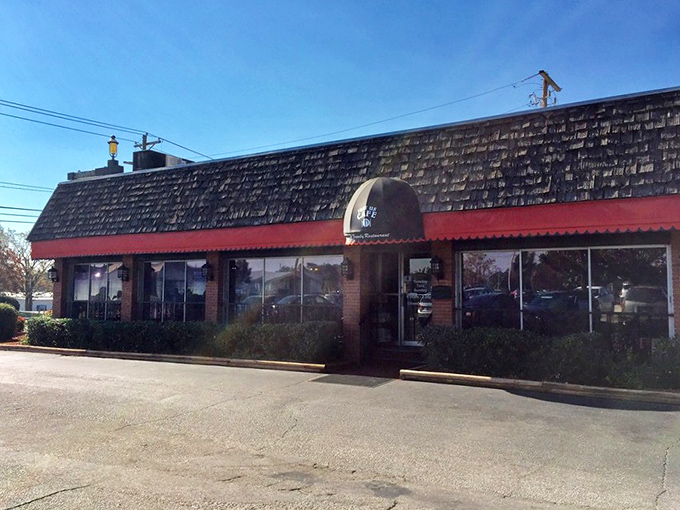 The welcoming entrance of Just Us Cafe promises a meal that's worth pulling over for – even in that trusty pickup truck.