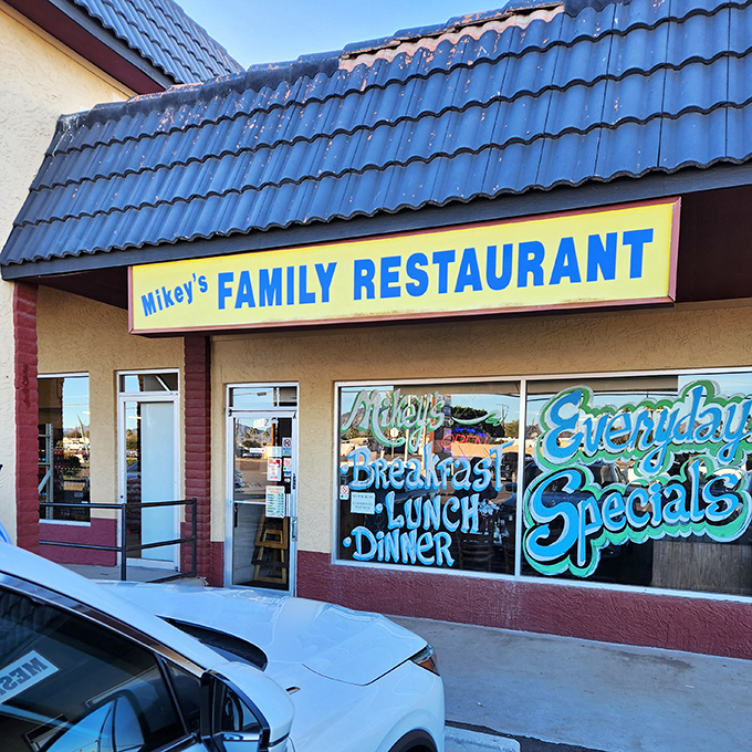 Those hand-painted window specials at Mikey's aren't just menu items – they're daily love letters to hungry Mesa residents.