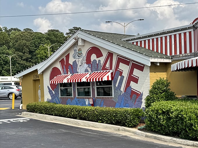 That playful OK Cafe mural practically winks at you, promising breakfast worth pulling off West Paces Ferry for.