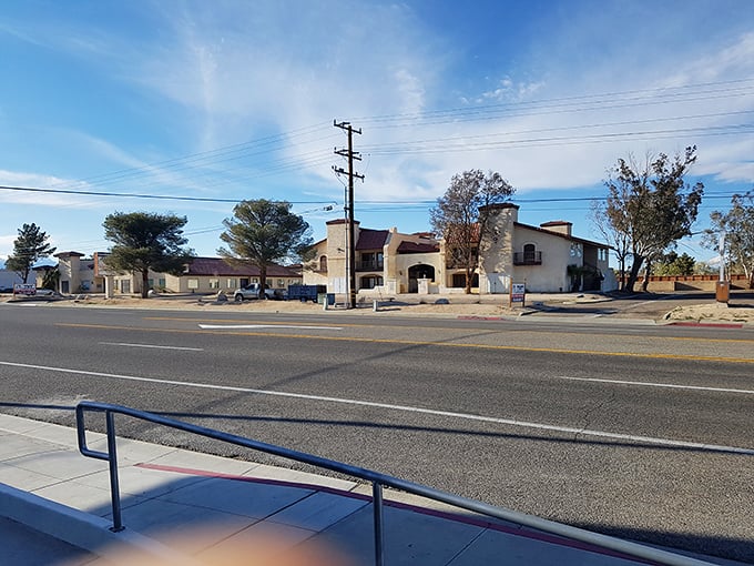 The morning sun bathes Ridgecrest’s main street in golden hues—a free light show for residents who appreciate affordable beauty.