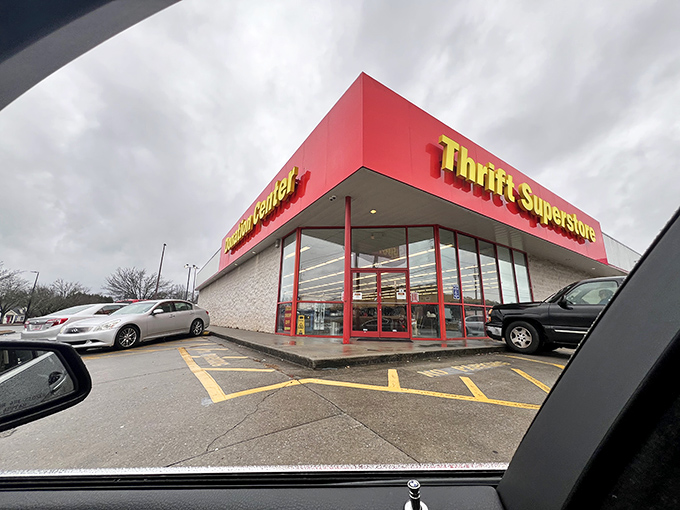 Dramatic skies frame this thrift cathedral! The red and yellow signage pops like a Broadway marquee announcing today's starring deals.
