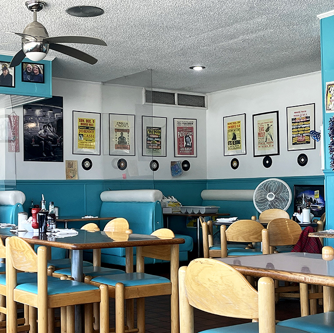 The vintage concert posters and vinyl records aren't just decoration—they're the soundtrack to your meal, taking you back to when Elvis was king and milkshakes had real ice cream.