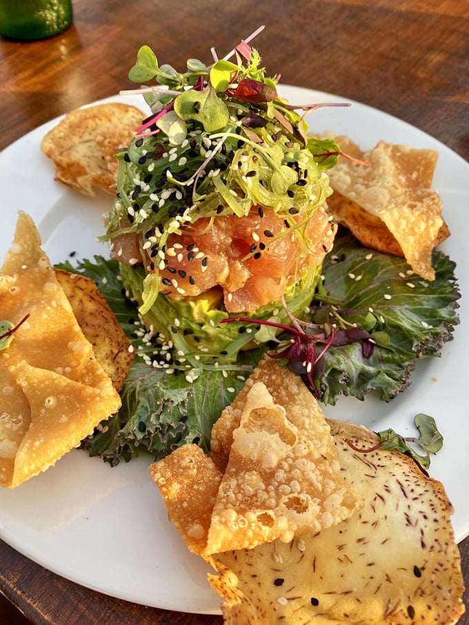 Ahi poke that's dressed better than most people at a beach wedding. Those wonton crisps provide the perfect crunch counterpoint.