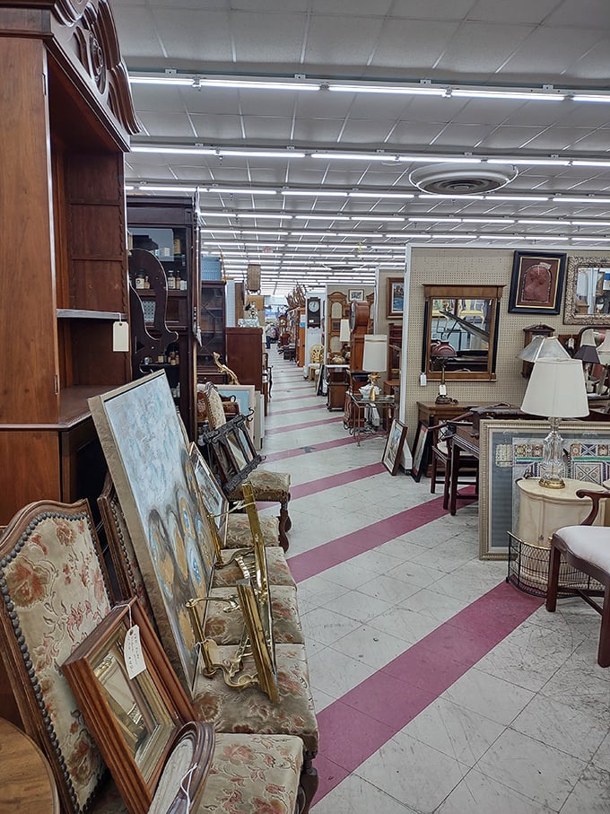 An aisle that could furnish Downton Abbey's forgotten attic. Mirrors reflect possibilities while frames await your memories.