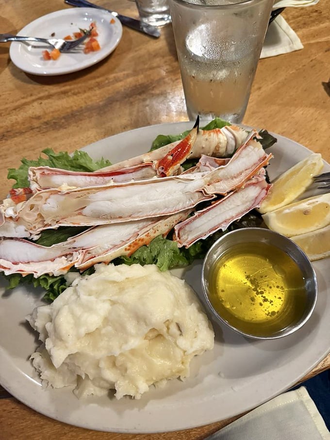 Alaskan crab legs presented with simple elegance—nature's perfect design requiring nothing more than drawn butter and determination.
