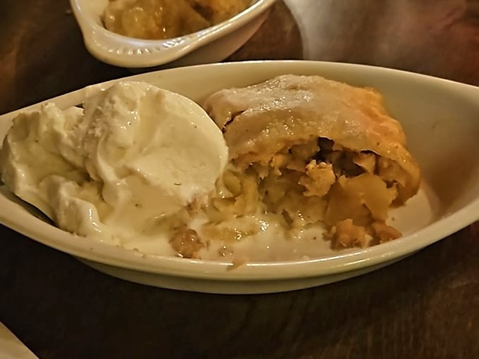 Apple strudel? No – this appears to be their famous apple dessert, where flaky pastry meets cinnamon-kissed fruit in a marriage made in comfort food heaven.
