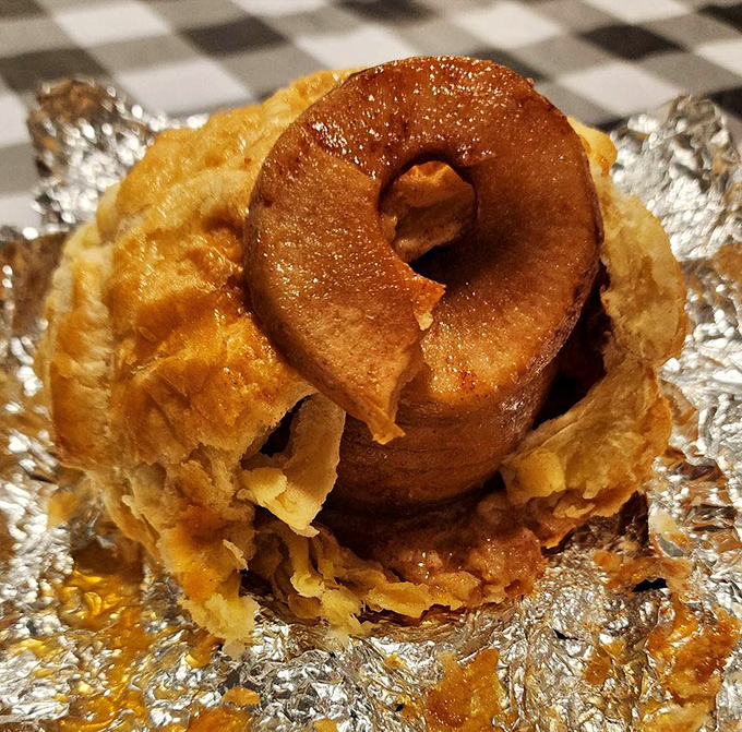 Not all heroes wear capes—some wear flaky pastry. This apple dumpling, wrapped in buttery goodness, is the dessert equivalent of a warm hug.
