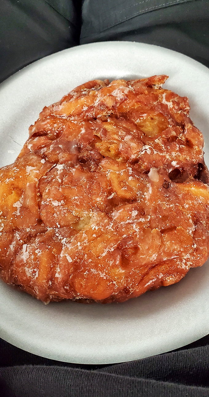 The legendary apple fritter—a beautiful chaos of dough, apples, and glaze that makes you question why you'd ever waste calories on lesser breakfast foods.
