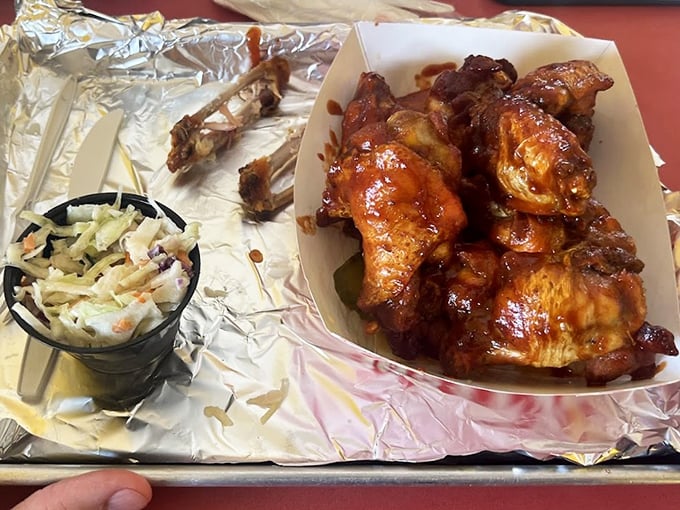 Wings that have clearly been introduced to fire and smoke before meeting their saucy destiny—a delicious transformation worth celebrating.