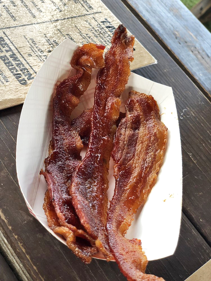 Candied bacon – because regular bacon wasn't indulgent enough. These caramelized strips are what would happen if bacon went to finishing school.