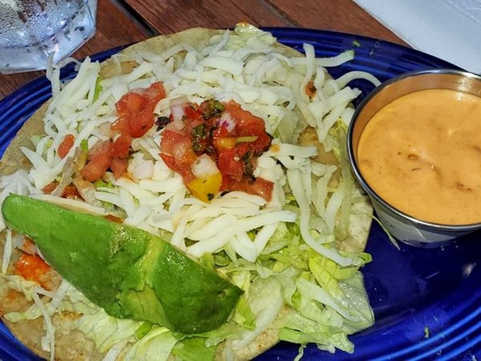 A proper taco should require strategic eating tactics. This loaded creation with fresh avocado and vibrant pico demands both napkins and your undivided attention.