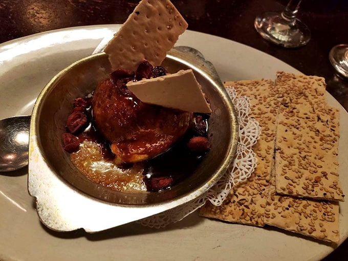 Baked brie wrapped in puff pastry with crackers – because sometimes sophisticated comfort food requires no apologies.