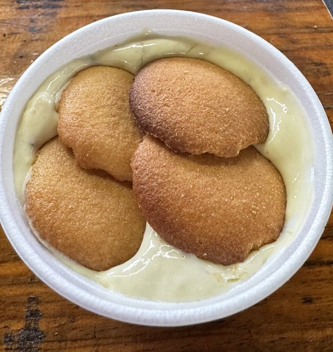 Banana pudding that doesn't try to reinvent the wheel – just perfect, nostalgic comfort in a cup that tastes like your childhood, only better.