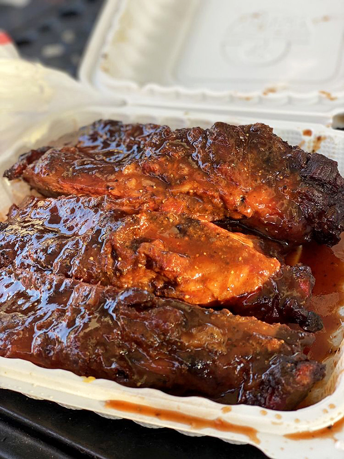 These ribs glisten with a lacquered finish that would make a furniture restorer jealous, promising flavor that lives up to their photogenic appeal. 