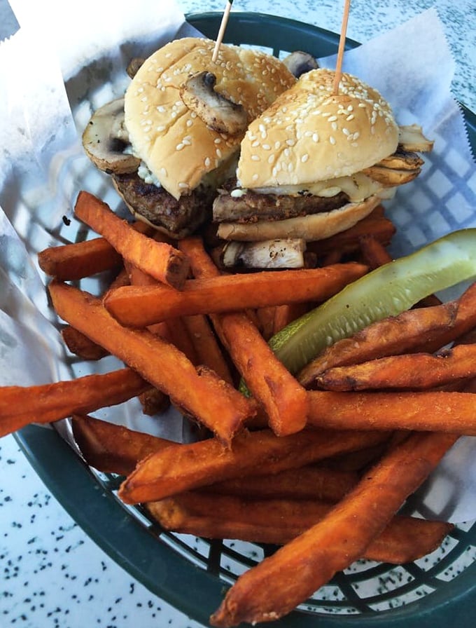 Sweet potato fries escort this burger like backup singers – crispy, golden, and stealing every scene they're in.
