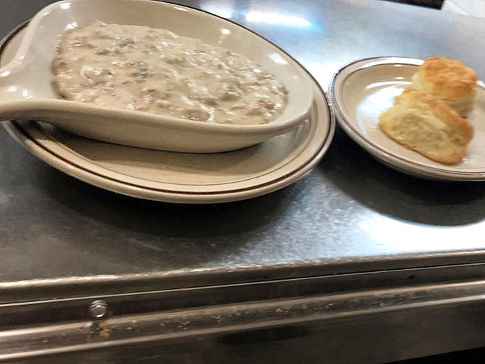 Southern comfort in a bowl—creamy biscuits and gravy that would make your grandmother nod in approval. Spoon required, diet optional.