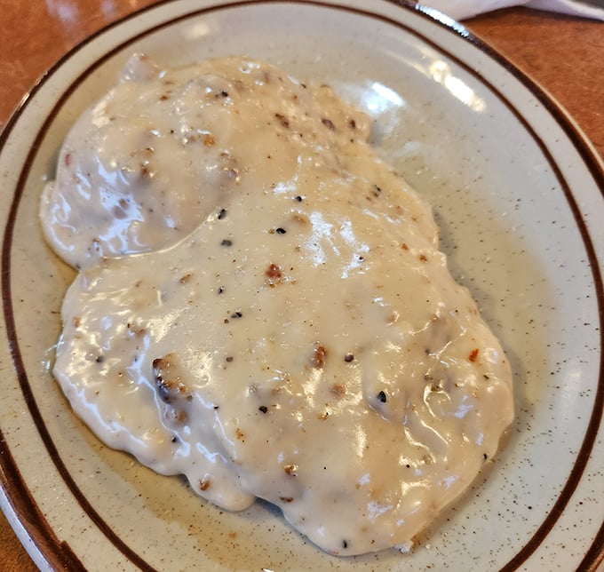 Biscuits and gravy – the comfort food equivalent of a warm hug from your grandmother, with pepper flecks promising just the right amount of personality.