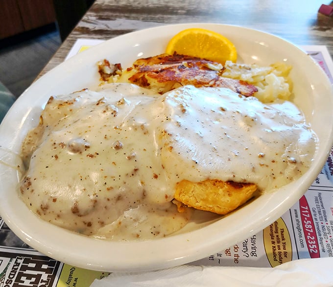 Biscuits smothered in sausage gravy – the kind of breakfast that makes you want to take a nap immediately after finishing it.