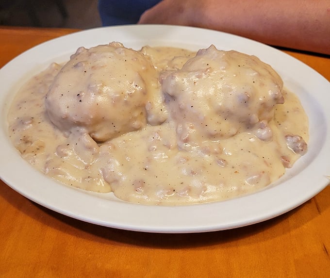 Biscuits and gravy—the breakfast of champions who plan on napping by noon. Creamy, peppery gravy blankets these fluffy islands of comfort.