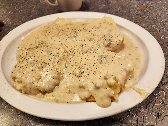 Biscuits drowning happily in creamy pepper-flecked gravy – Southern comfort that makes Monday mornings slightly more bearable for Kansas Citians.