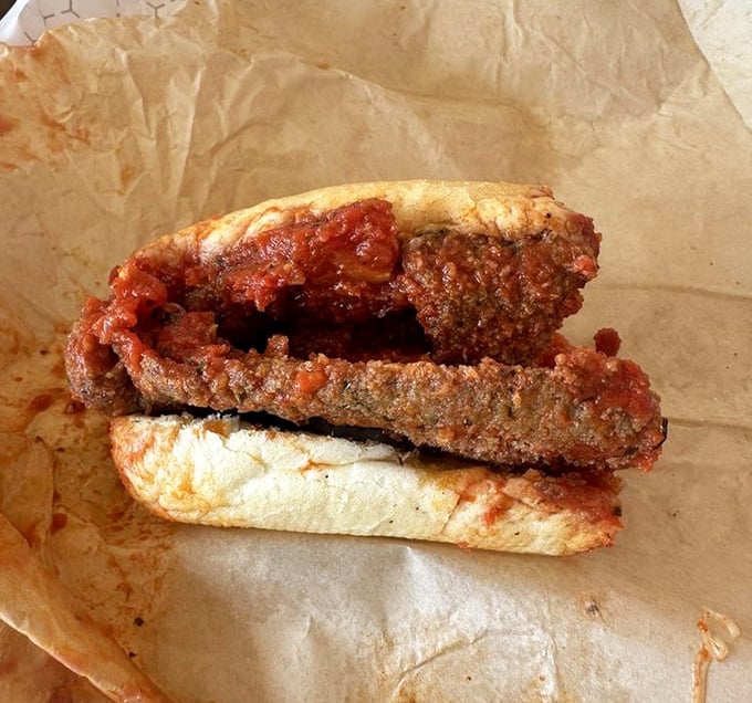 The breaded steak sandwich smothered in red gravy – comfort food that hugs your insides and makes you forget about that "beach body" nonsense.