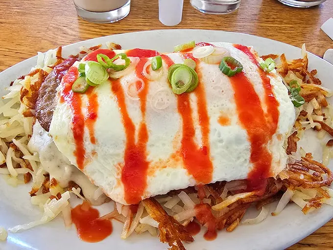 This isn't just breakfast wrapped in a tortilla – it's morning joy smothered in sauce with enough heft to fuel you through life's marathon.