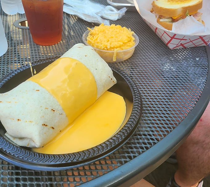 Breakfast wrapped in a portable hug – this burrito with its melty cheese promises to turn even the most challenging morning into something manageable.