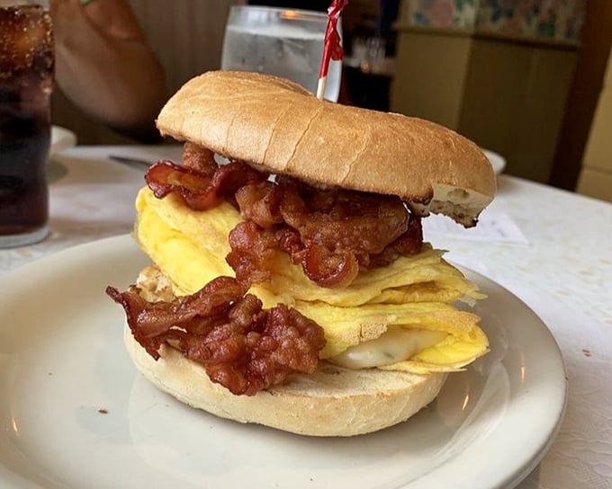 The breakfast sandwich that says "good morning" louder than your alarm clock – eggs, bacon, and no pretension.