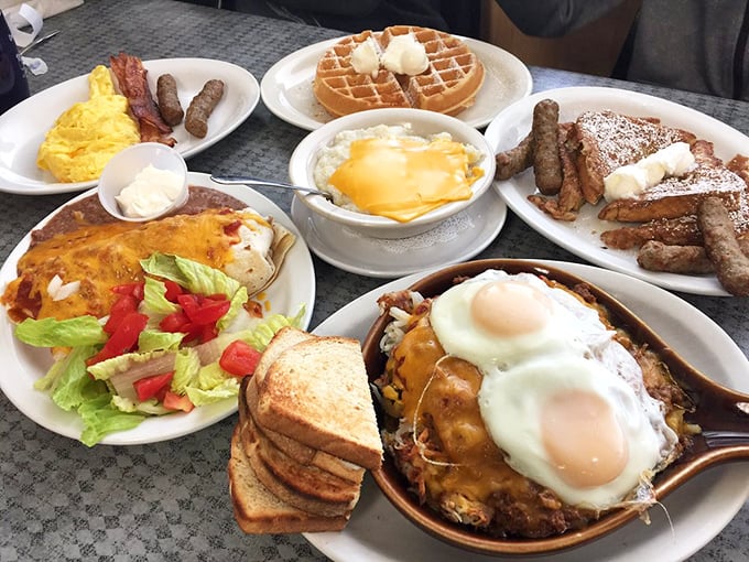The breakfast spread that makes vacation calories not count. Waffles, French toast, eggs, and sausage – the Mount Rushmore of morning meals.
