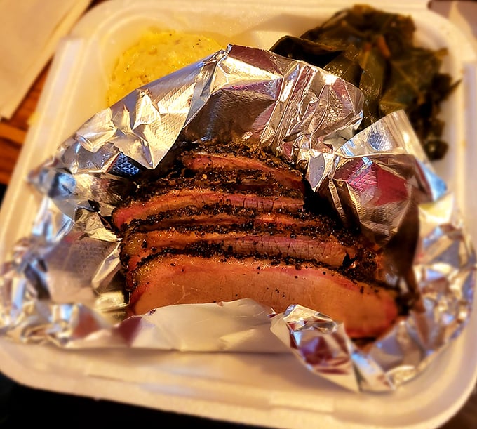 Brisket with that textbook smoke ring – the barbecue equivalent of Olympic gold. Wrapped in foil like the precious gift to humanity it truly is.