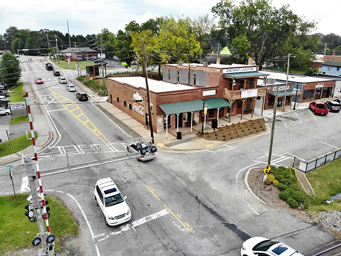 Broad Street's intersection captures Austell's essence – where small-town infrastructure meets big-hearted community, all under that brilliant Georgia sky.